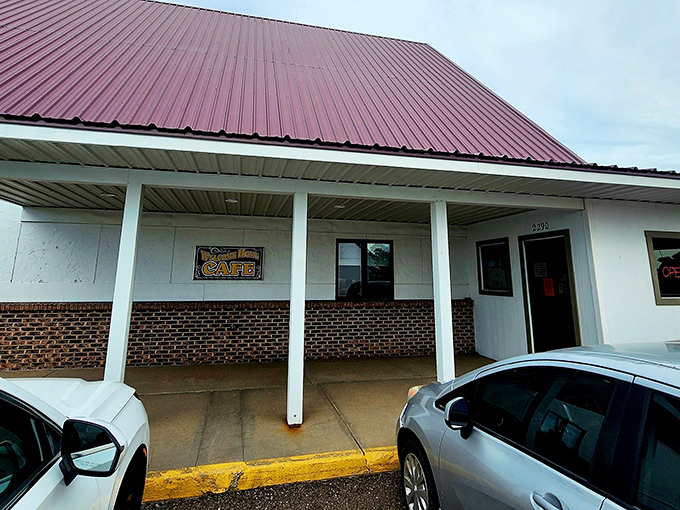 The unassuming exterior of Welcome Home Cafe in Colby might not scream "culinary destination," but that metal roof shelters some serious home cooking magic.