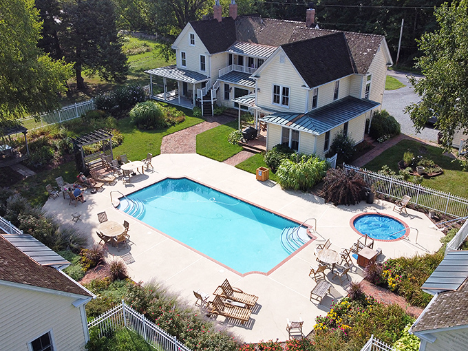 An aerial view that answers the eternal vacation question: "Pool or hot tub?" At George Brooks House, the correct answer is clearly "both."