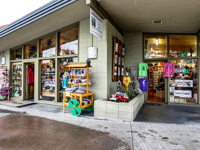 The unassuming storefront of Kactus Jock beckons with colorful displays that spill onto the sidewalk, promising treasures within that celebrate all things Arizona.