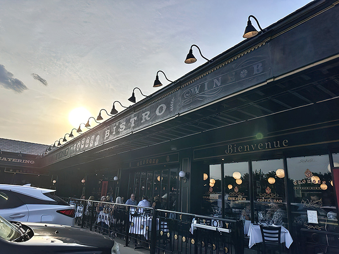 The black and gold fa&ccedil;ade of Georges French Bistro stands proudly against the Kansas sky, promising Parisian delights with Midwestern hospitality.