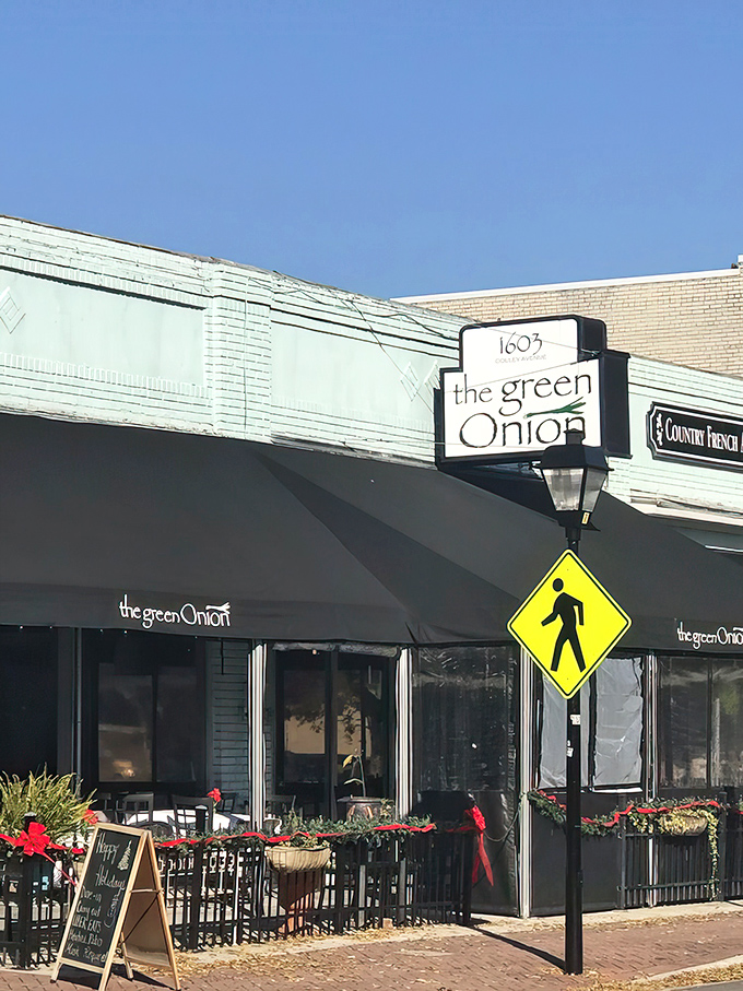 The Green Onion's charming exterior welcomes you with its understated elegance and inviting patio. Like a good first date, it makes a promising impression without trying too hard.