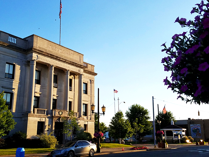 A rainbow graces the hills of Logan, nature's way of saying "stick around, the show's just getting started." 