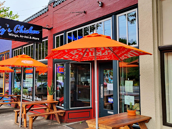 The bright red exterior with vibrant orange umbrellas isn't just eye-catching&mdash;it's nature's way of signaling something delicious awaits inside.