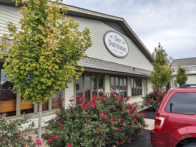 The welcoming facade of Der Dutchman stands like a beacon of comfort food, promising Amish delights that'll make your taste buds do a happy dance.