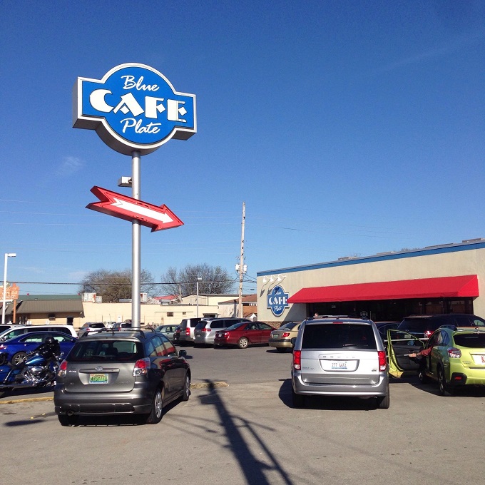 A blue-trimmed beacon of breakfast bliss! This unassuming exterior hides a treasure trove of Southern comfort food that'll make your taste buds dance.