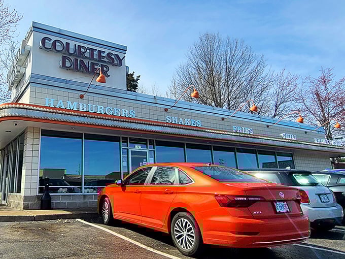 Courtesy Diner's retro sign beckons like a lighthouse for the hungry, promising comfort food and a slice of Americana.