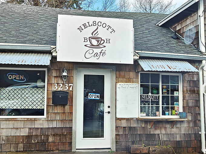 Quaint charm meets culinary magic! This cozy shingle-clad caf&eacute; looks like it was plucked straight from a Norman Rockwell painting, promising comfort food with a side of nostalgia.