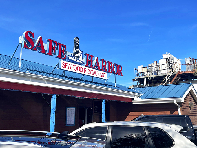 The blue roof and bold red signage beckon like a lighthouse for hungry souls. Simplicity on the outside, seafood magic within.