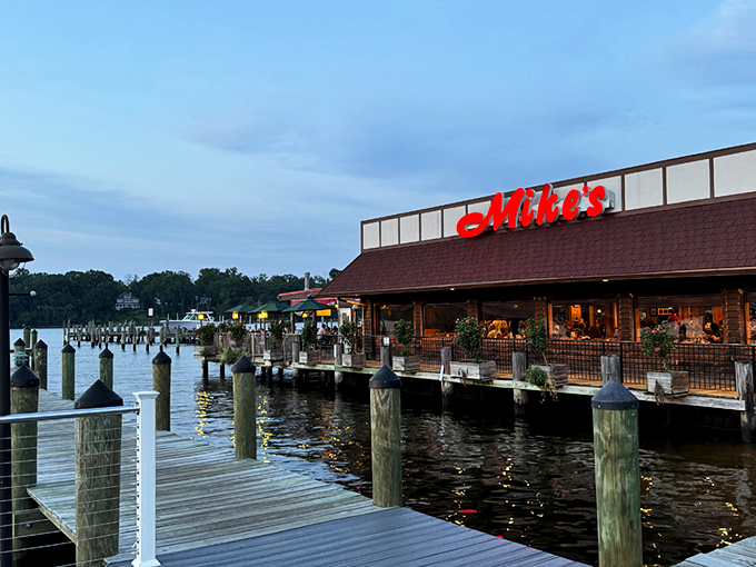 Waterfront dining doesn't get more literal than this—Mike's iconic red sign beckons hungry seafood lovers like a lighthouse for the famished.