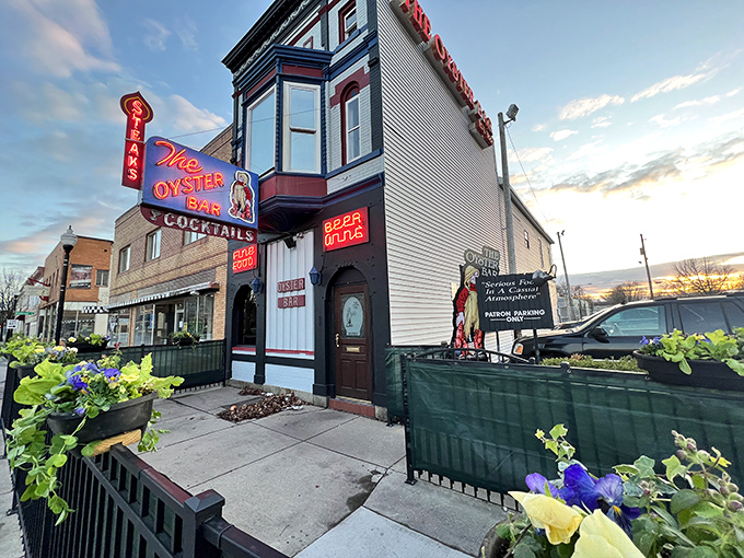 The Oyster Bar's iconic fa&ccedil;ade stands as a beacon of seafood excellence in downtown Fort Wayne, complete with vintage neon signage that whispers, "Yes, we've been doing this right for decades."