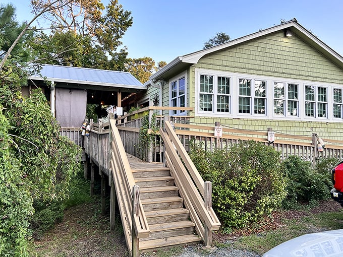 The climb up these wooden steps feels like a pilgrimage to culinary heaven. Green-shingled charm awaits.