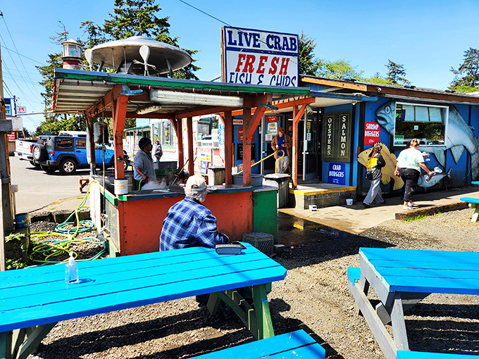 The colorful exterior beckons seafood lovers like a lighthouse calls to ships. Those vibrant picnic tables aren't just furniture&mdash;they're stages for impending seafood euphoria. 