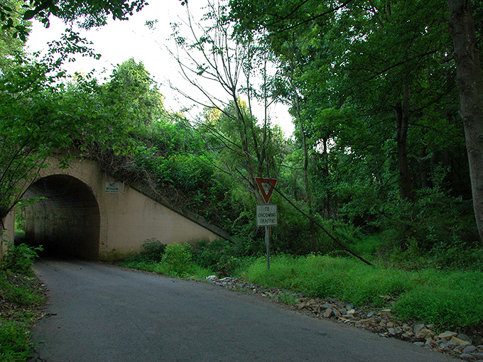 Innocence by day, mystery by night. The unassuming entrance to Bunny Man Bridge looks like something from a storybook&mdash;until the sun sets.