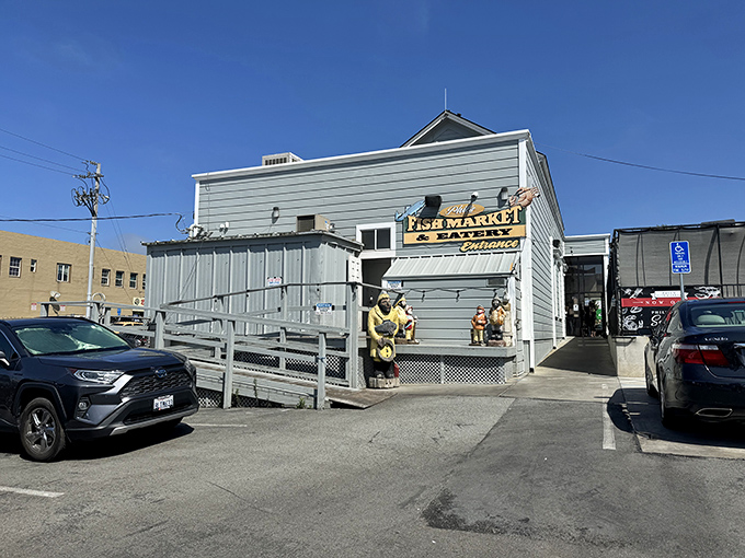 The unassuming blue exterior of Phil's Fish Market & Eatery stands like a salty sea captain &ndash; weathered, unpretentious, and hiding treasures within.