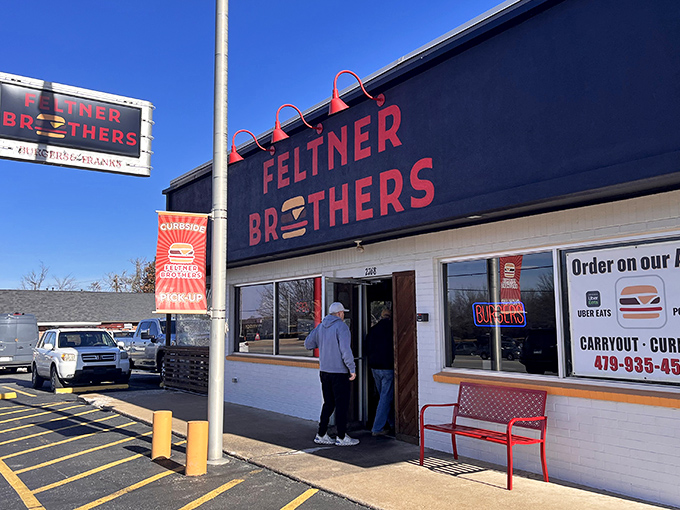 The unassuming exterior of Feltner Brothers stands like a beacon of hope for hungry travelers seeking hot dog salvation in Fayetteville.
