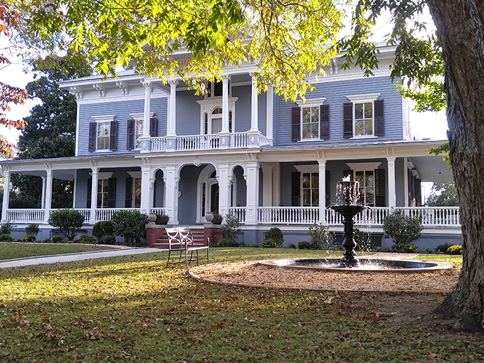 The stately blue Victorian fa&ccedil;ade of Elmwood 1820 stands proudly with its white columns and wrap-around porch, beckoning visitors to slow down and stay awhile.