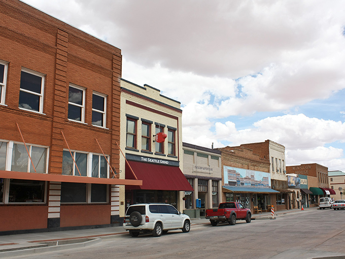 The famous corner in Winslow, Arizona, complete with Route 66 shield painted right on the pavement. Rock and roll geography at its finest!
