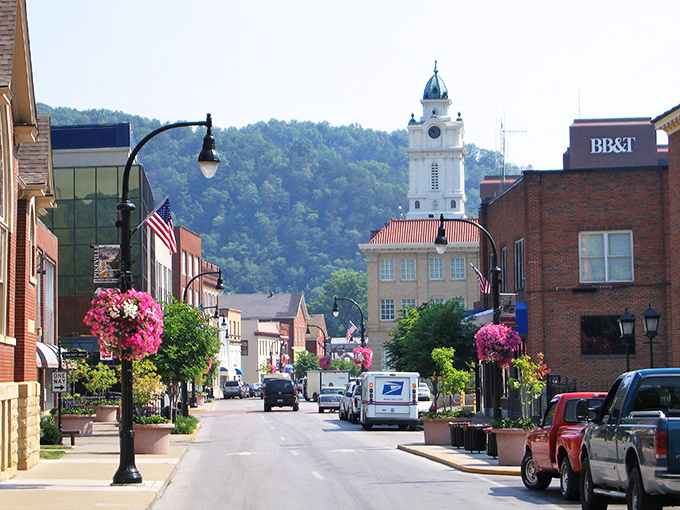 Pikeville's historic downtown showcases classic brick architecture against a backdrop of blue Kentucky skies, where small-town charm meets thoughtful preservation.