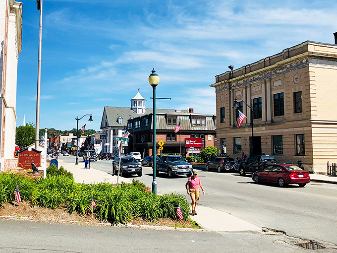 Littleton's iconic white building with its distinctive clock tower stands like a sentinel over Main Street, where Norman Rockwell scenes come to life daily.