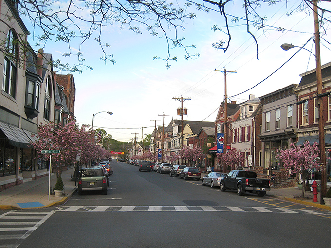 Cherry blossoms frame Main Street like nature's confetti, transforming Clinton into the kind of place where stress dissolves faster than aspirin.