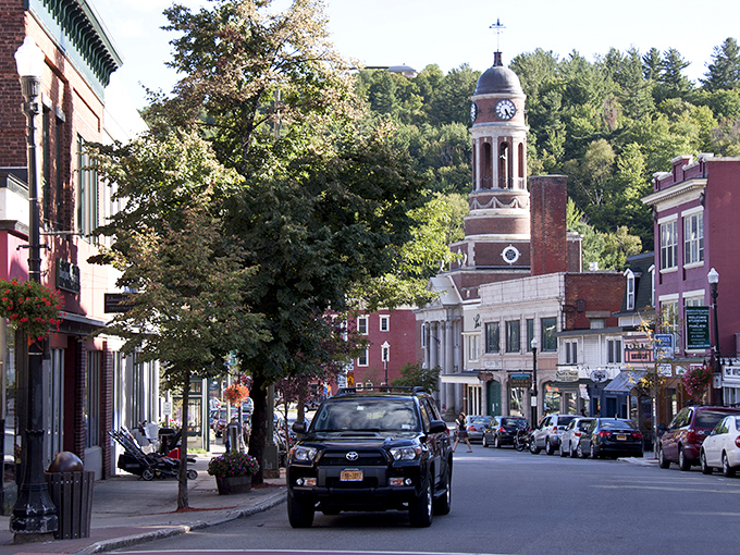 Main Street magic in action—historic buildings housing local businesses where conversations with strangers become the best souvenir you'll bring home.