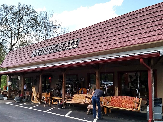 The red-roofed time capsule beckons with its colorful bicycle sentries standing guard. Like a portal to the past, Brown County Antique Mall promises treasures beyond that unassuming facade.