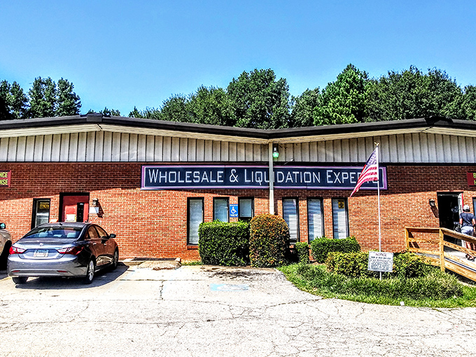 The unassuming brick fa&ccedil;ade of Matt's Warehouse Deals hides a treasure trove within, like finding the secret entrance to bargain paradise.