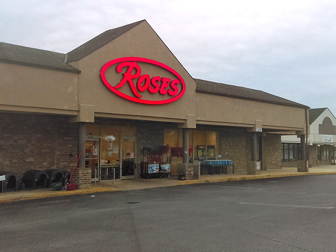 The iconic red Roses sign beckons bargain hunters like a retail lighthouse guiding ships to shore. Treasure awaits inside! 