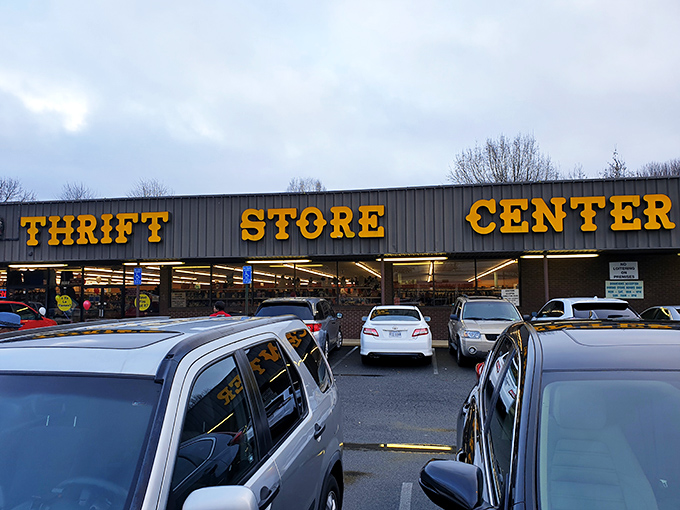 The bold yellow lettering of "THRIFT STORE CENTER" beckons like a siren song to bargain hunters. No fancy frills, just the promise of treasures waiting inside.