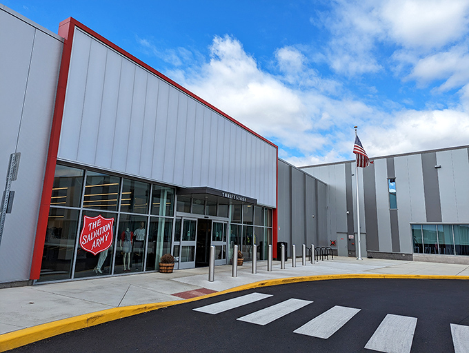 The gleaming white exterior with its bold red trim isn't just a building&mdash;it's a portal to possibility. Treasure awaits inside.