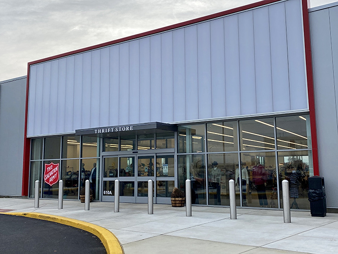 The gleaming white exterior with its bold red trim isn't just a building&mdash;it's a portal to possibility. Treasure awaits inside.