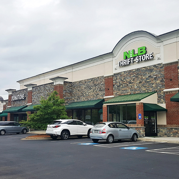 The stone-and-brick exterior with that signature bright green signage serves as a beacon for bargain hunters throughout Woodstock. Hidden treasures await inside!