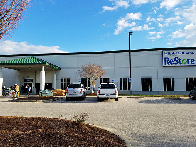 The unassuming exterior of Habitat Wake ReStore hides a treasure trove within, much like that plain-looking book that turns out to be the best read of your life.