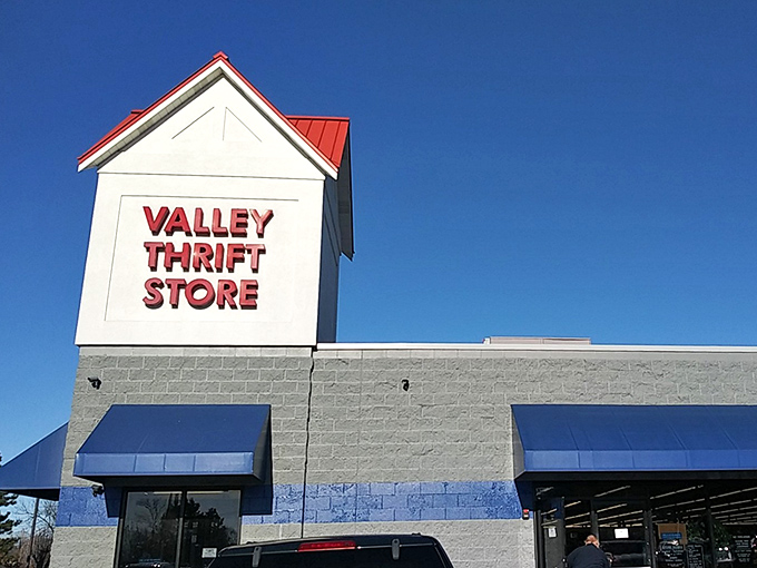 The blue-fronted fortress of frugality awaits! Valley Thrift Store's unassuming exterior hides a universe of secondhand treasures inside.