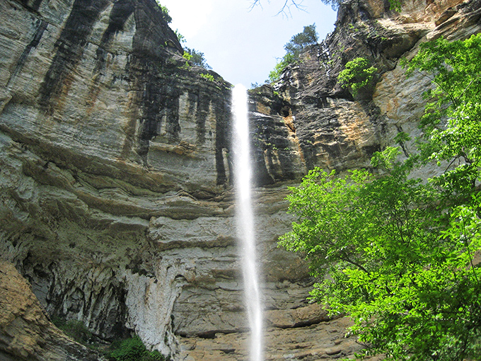 Nature's skyscraper in reverse &ndash; Hemmed-In Hollow's 209-foot cascade plummets down layered limestone cliffs, creating a spectacle worth every step of the journey.
