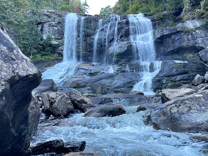Nature's masterpiece on full display&mdash;Whitewater Falls cascades 811 feet through lush Appalachian forest, creating a scene worthy of the most ambitious landscape painting. 