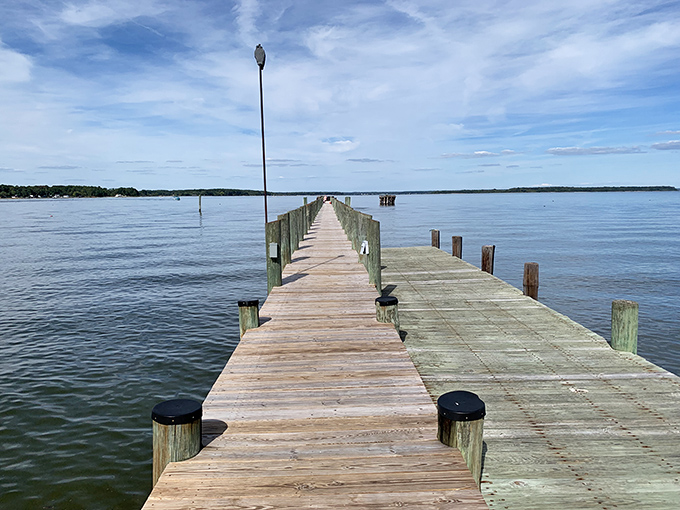 The wooden pier stretches toward St. Clement's Island like a time-travel portal, inviting you to step back to where Maryland's story began.