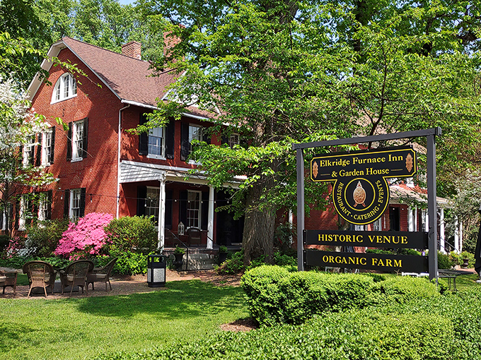 History wrapped in brick and mortar! The Elkridge Furnace Inn's stately exterior whispers stories from the 1700s while promising modern culinary delights inside.