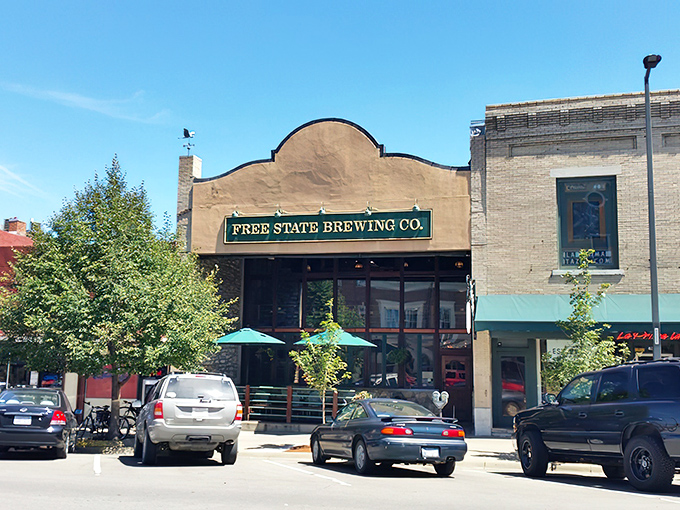 The unassuming facade of Free State Brewing Company beckons like an old friend. Kansas sunshine illuminates this downtown Lawrence landmark where beer dreams come true. 
