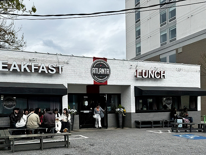 The white brick building stands like a breakfast beacon in downtown Atlanta, promising morning salvation to the hungry masses.