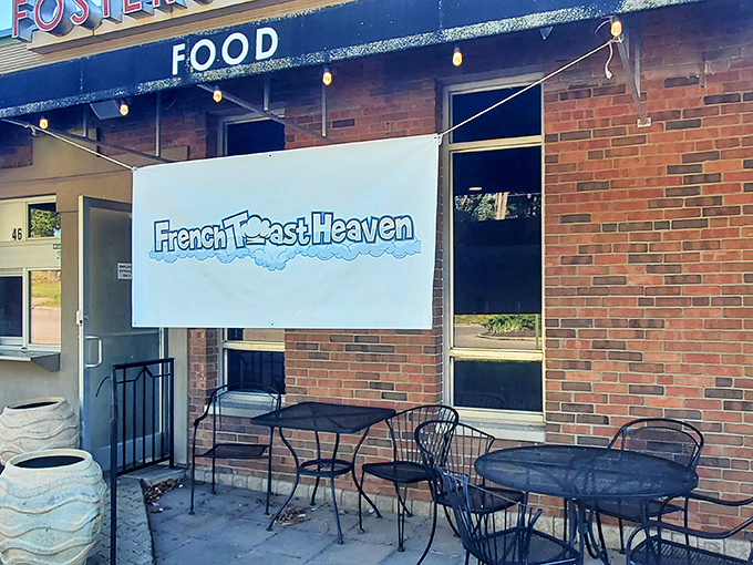 The unassuming storefront might not scream "culinary destination," but that chalkboard sign is like a beacon for breakfast enthusiasts across Ohio.