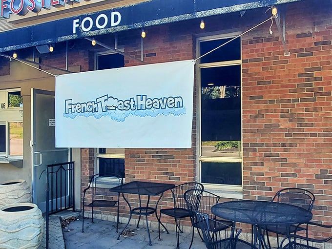 The unassuming storefront might fool you, but that chalkboard sign is basically a treasure map to breakfast nirvana.