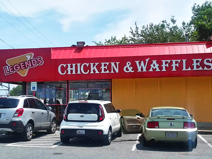 The bright red awning of Legends Chicken & Waffles beckons like a culinary lighthouse, promising salvation for the hungry souls of Hyattsville. No fancy architecture needed when what's inside tastes this good.
