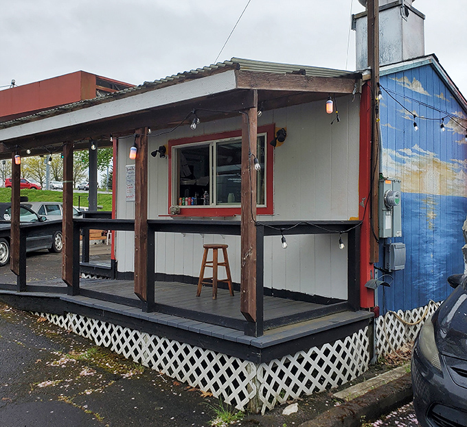 The unassuming white shack with its bold red logo promises a flavor explosion that belies its humble exterior. Southern heat meets Pacific Northwest charm. 