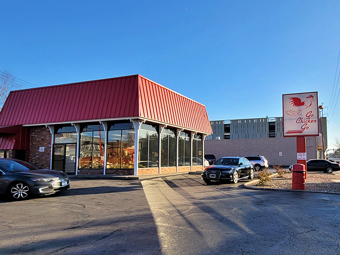 That iconic red building isn't trying to blend in. Go Chicken Go announces itself with all the subtlety of a rooster at dawn, and that's exactly why we love it.