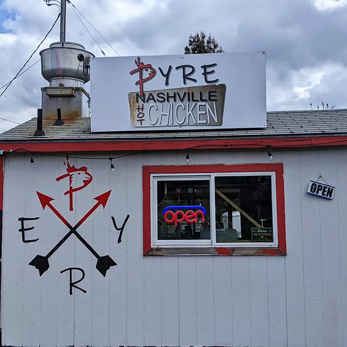 The unassuming exterior of Pyre Nashville Hot Chicken proves once again that culinary treasures often hide in the most modest packages.