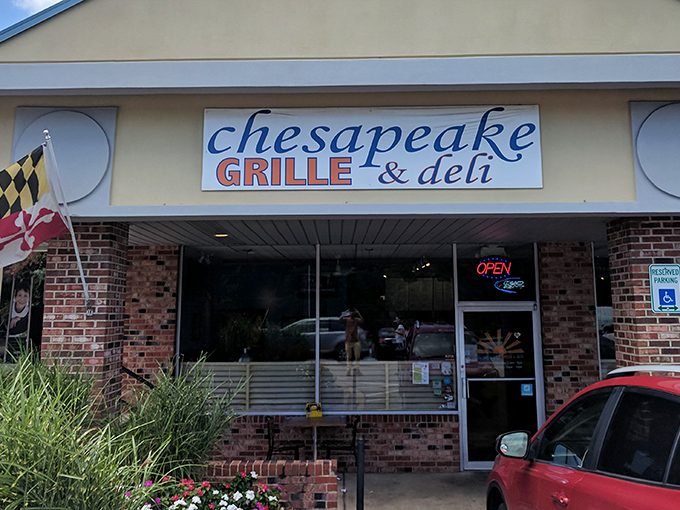 The unassuming exterior of Chesapeake Grille & Deli hides culinary treasures within, like a delicious speakeasy for burger enthusiasts.