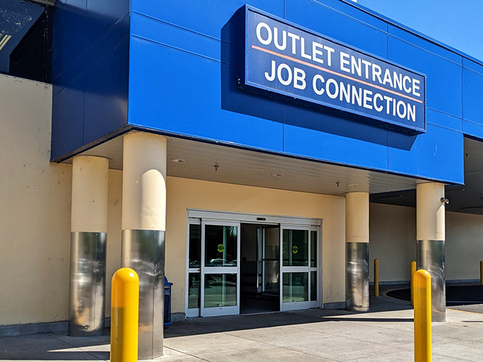 The blue and white facade of Goodwill's Outlet Entrance isn't just a storefront&mdash;it's the gateway to Portland's most ambitious treasure hunts.