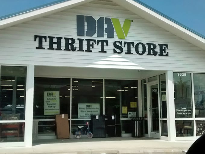 The unassuming exterior of DAV Thrift Store stands like a humble guardian of treasures, its simple signage belying the wonderland of bargains waiting inside.