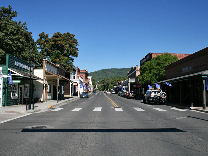 Jacksonville's aerial view reveals a perfect small-town grid nestled against forest-covered hills. Main Street could double as a movie set for "Charming America."
